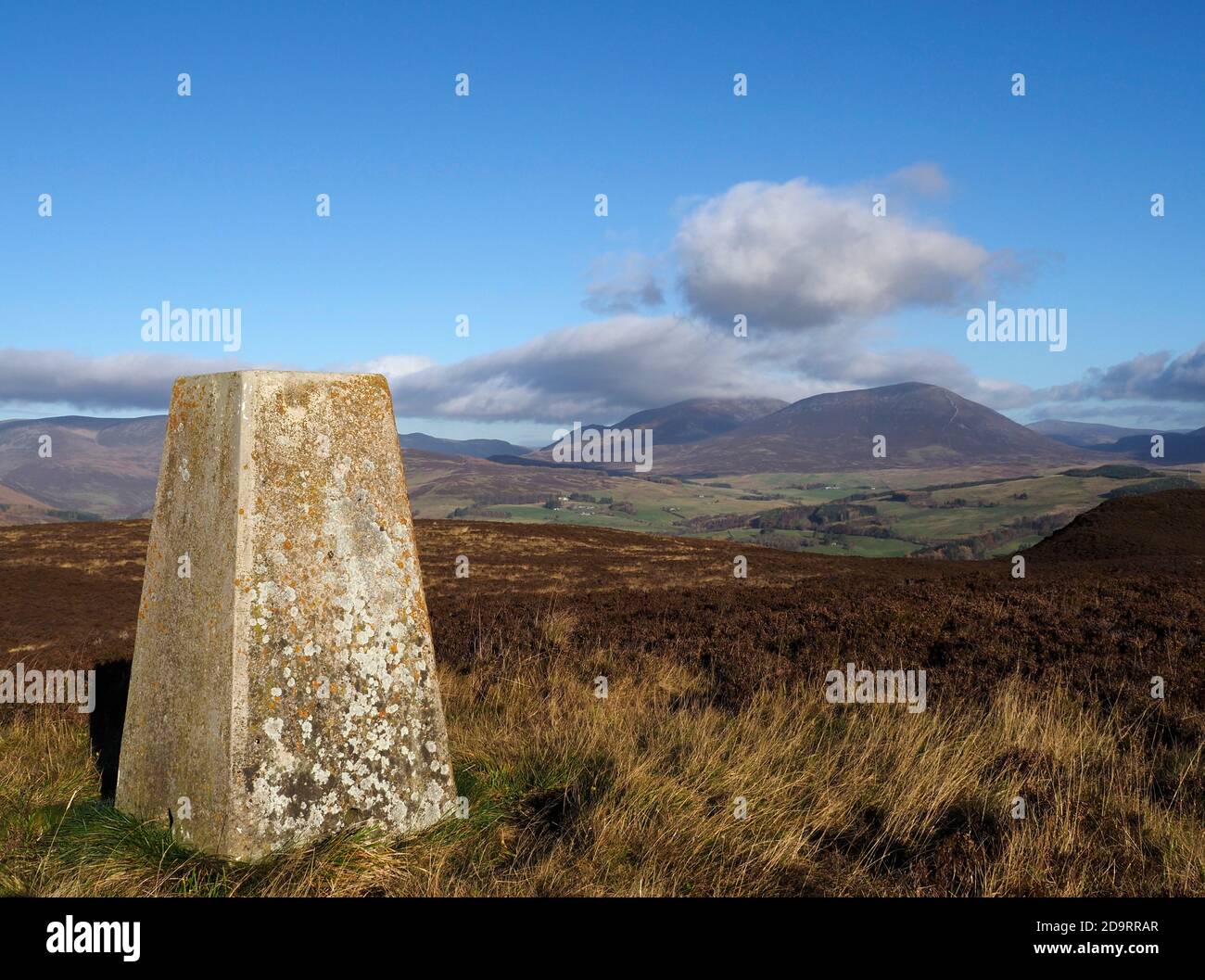 Trig point, summit of Tulach hill, Blair Atholl, Scotland with Beinn a ...