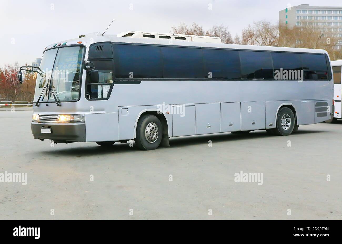 big tourist buses on parking Stock Photo - Alamy