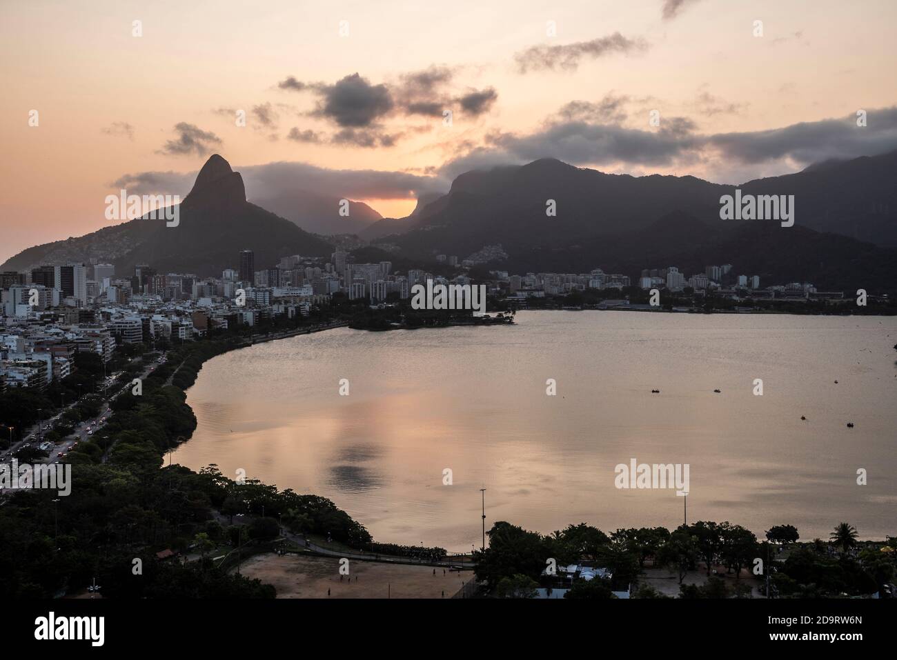 View to city lagoon and beautiful sunset behind mountains, Rio de ...