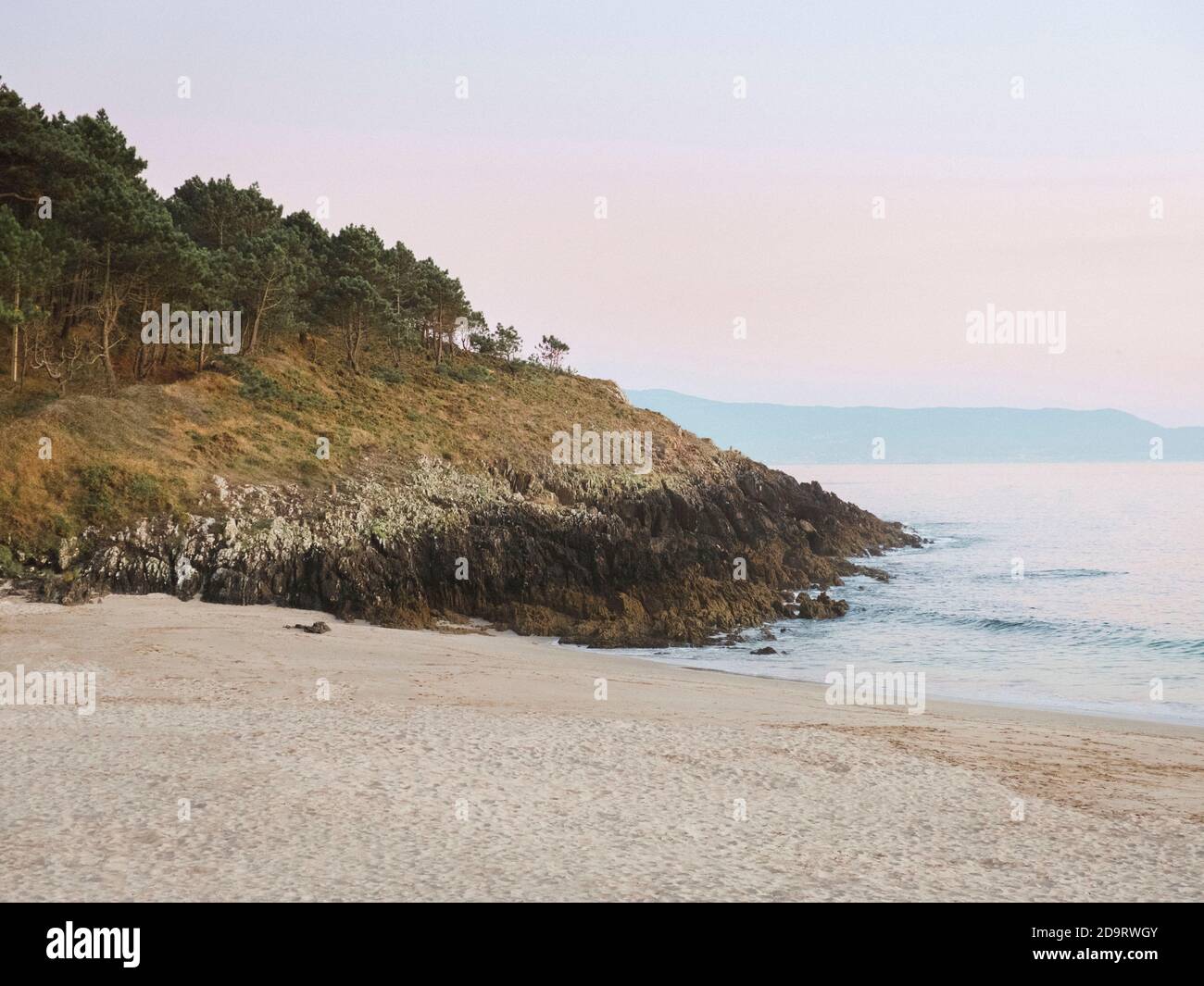 Soft sunset at the beach Stock Photo - Alamy