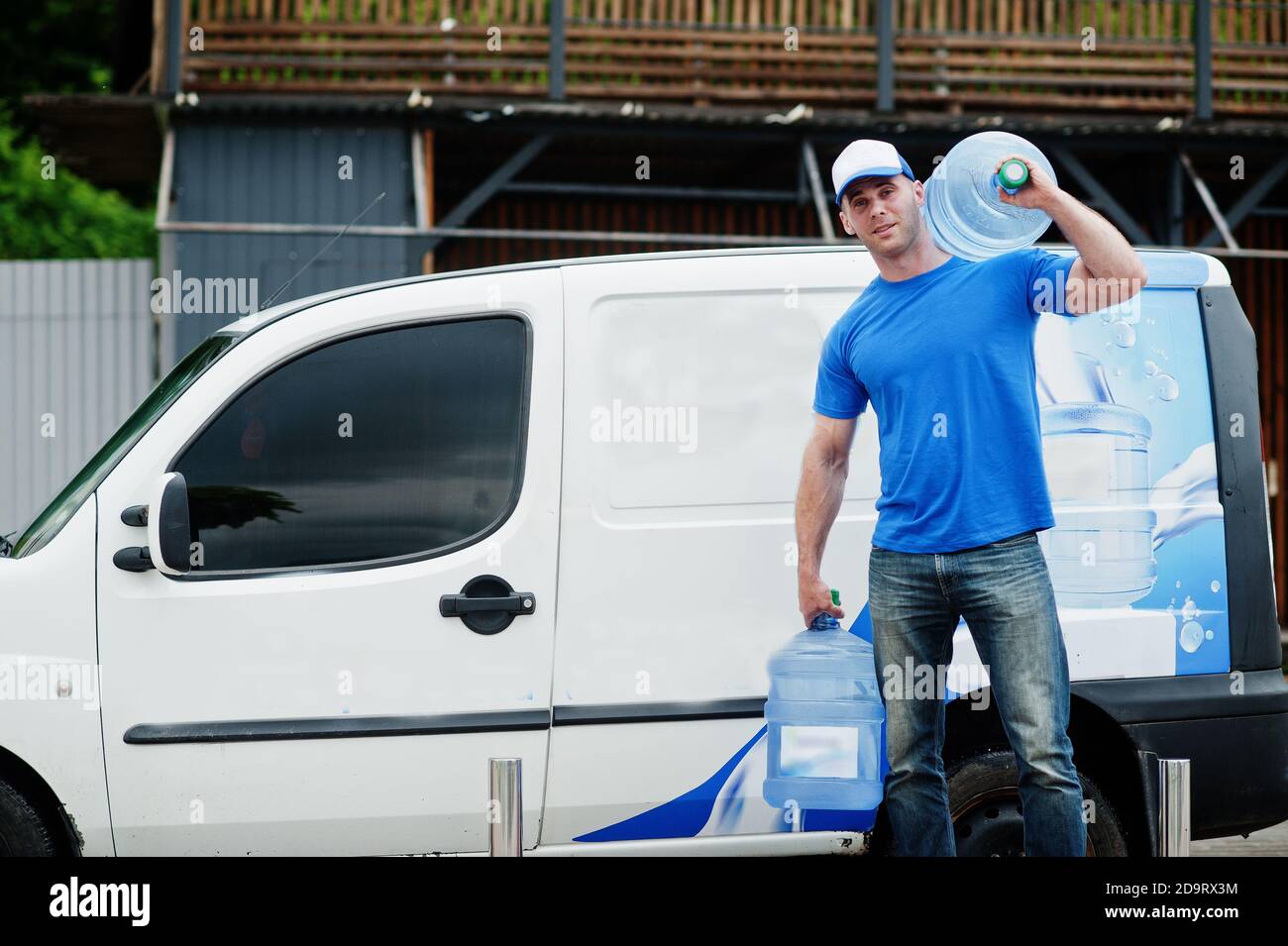 Water Delivery Delivering Truck High Resolution Stock Photography and ...