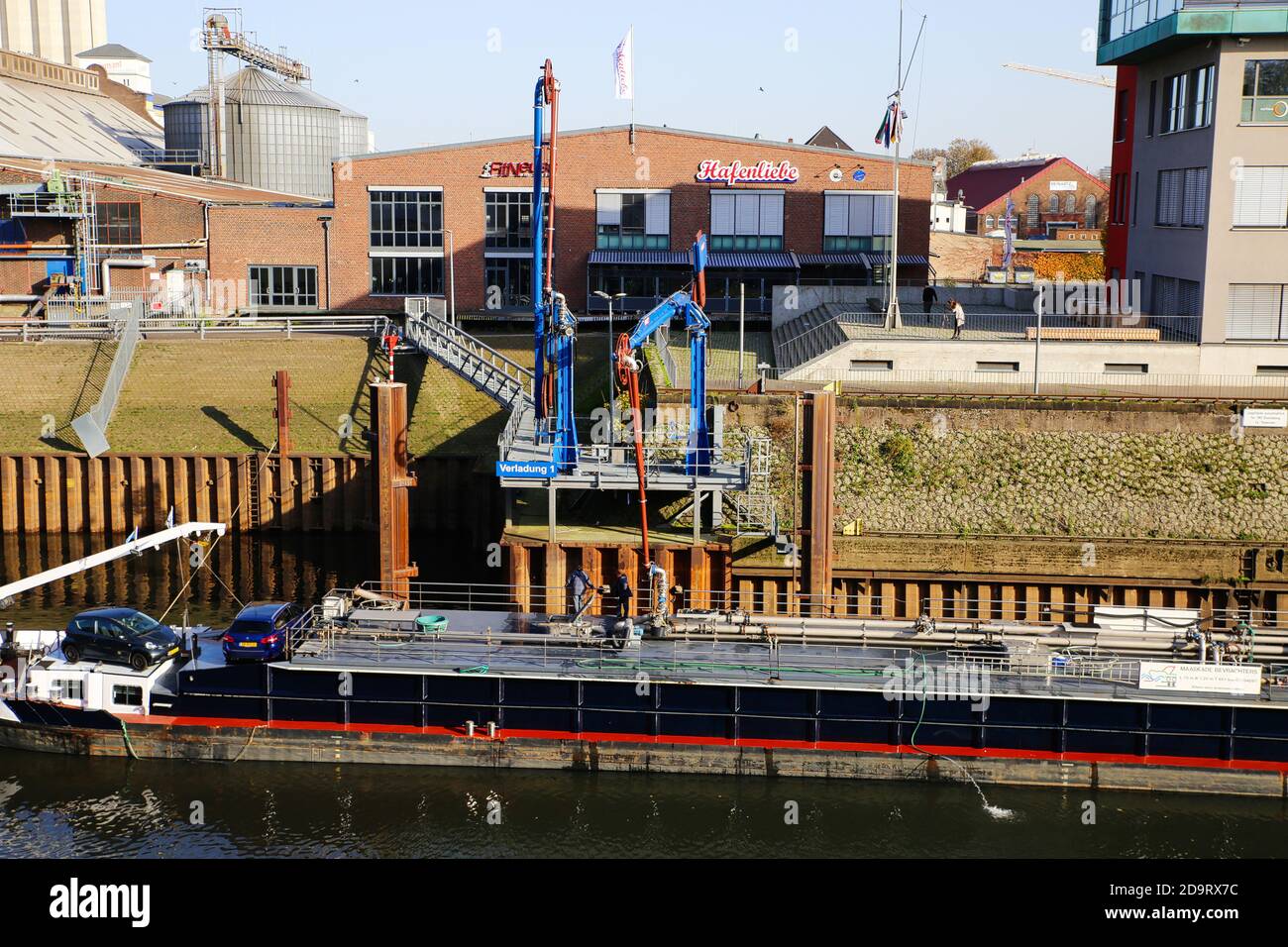 Neuss, Germany - November 11. 2020: View on old historic inland loading ...