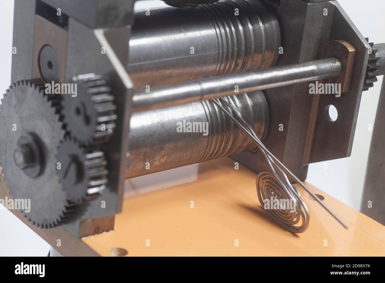 Jewelry rolling mill tool press rolling of a silver wire Stock Photo ...
