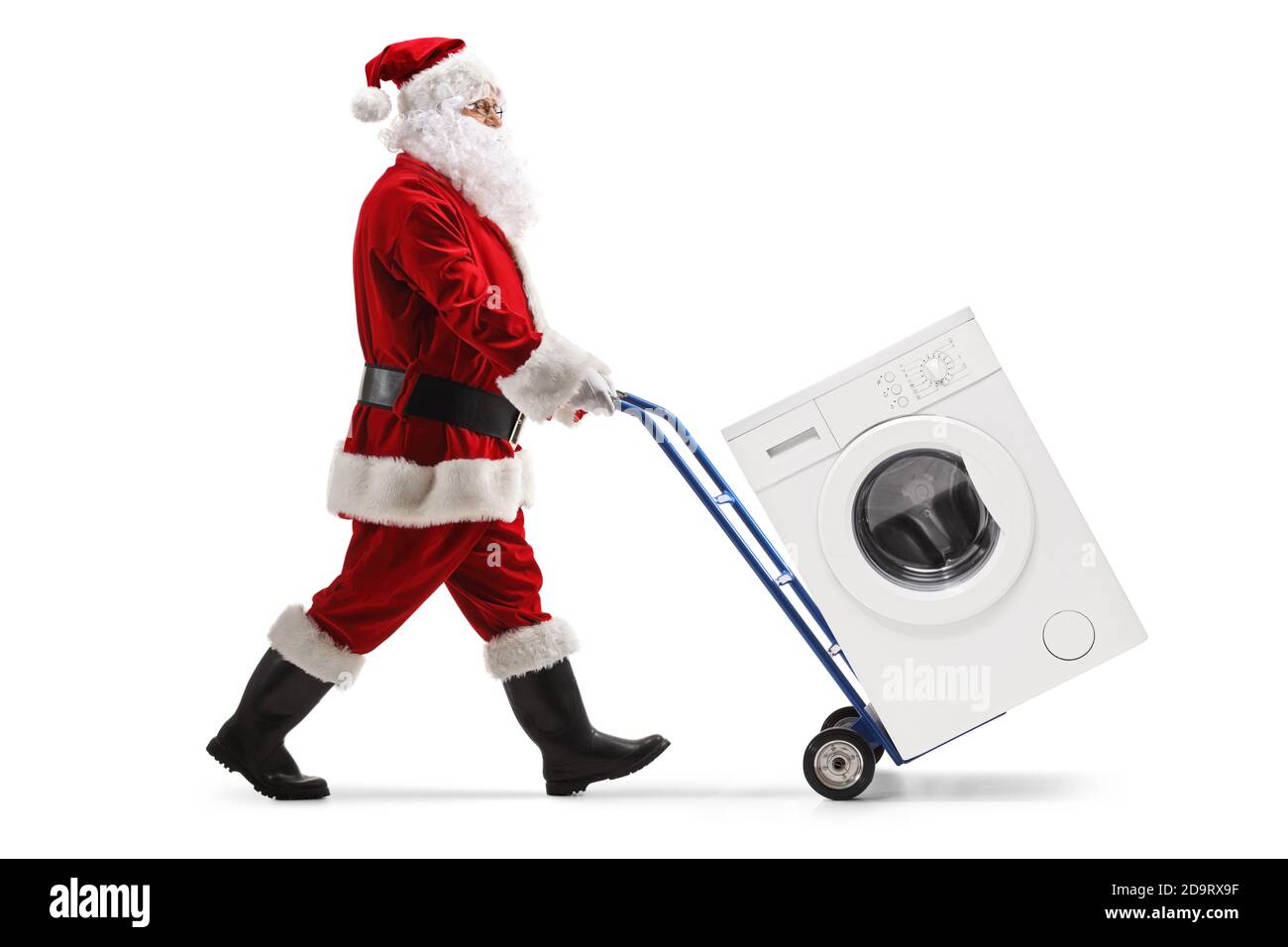 Full length portrait of a santa claus pushing a washing machine on a ...