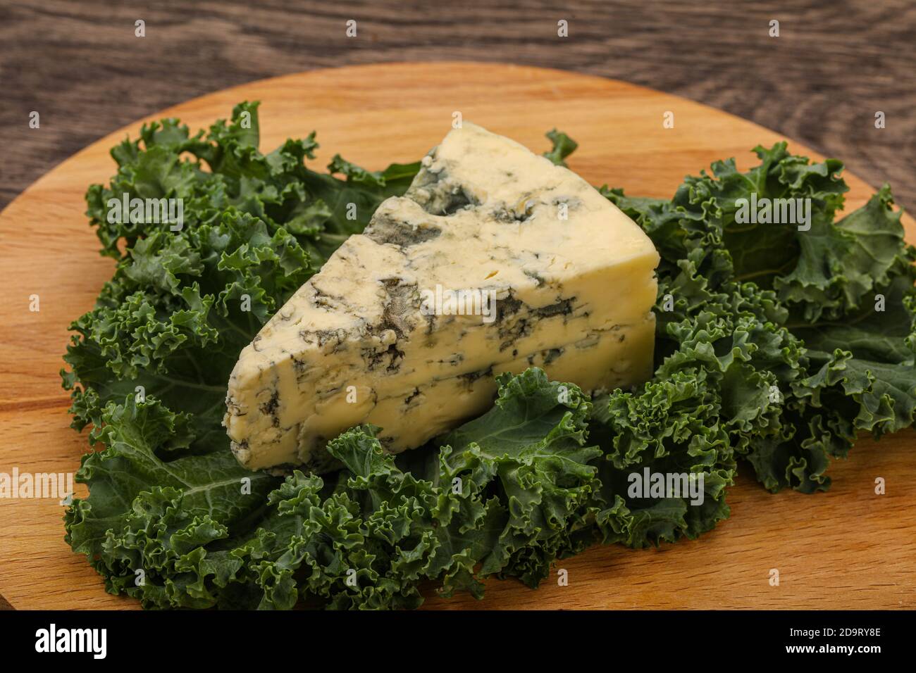 Dairy Blue cheese triangle with mold Stock Photo - Alamy