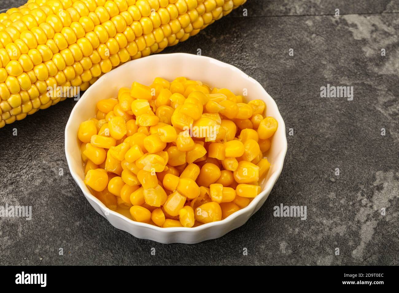 Sweet yellow corn grain in the bowl Stock Photo - Alamy