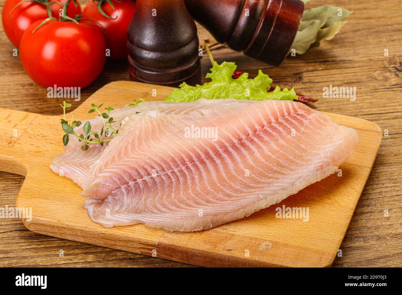 Raw tilapia fish fillet for cooking Stock Photo - Alamy