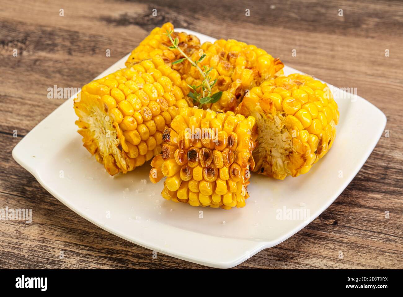 Grilled hot corn with oil and salt Stock Photo - Alamy