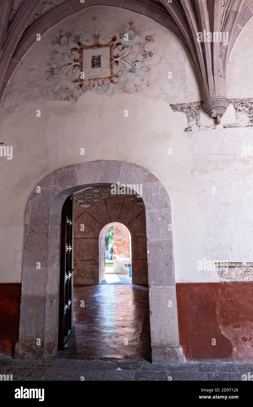 Interior hallway with painted mural at the San Nicolas Tolentino Temple ...