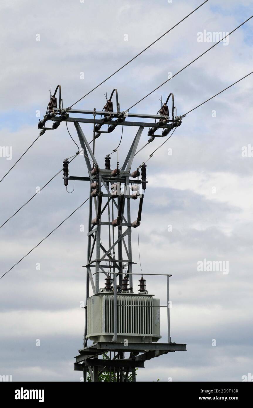 an electricity Transformer with a cloudy sky in the background Stock ...