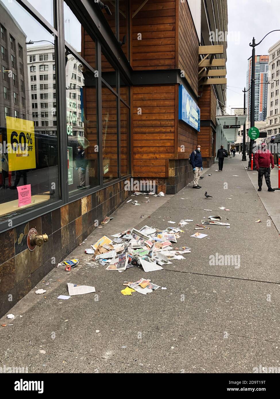 Seattle, USA. 22th Mar, 2020. Midday garbage all over the street ...