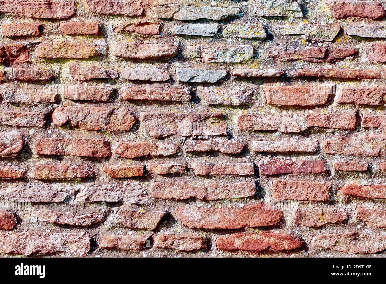 Close up of a sandstone wall, the structure made up of narrow slabs of ...