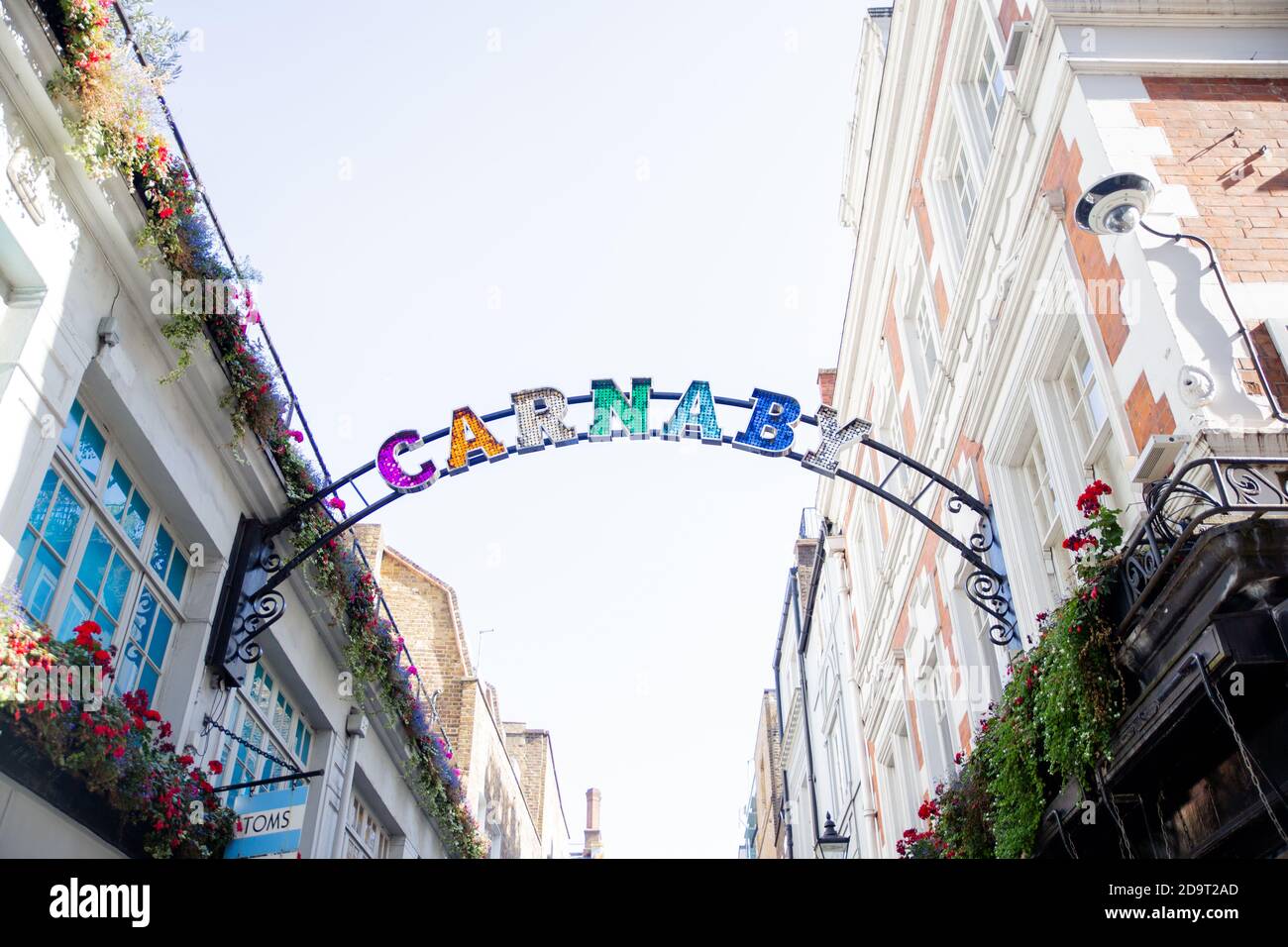 The Carnaby Street Colorful Signboard Hanging Between Two Buildings ...