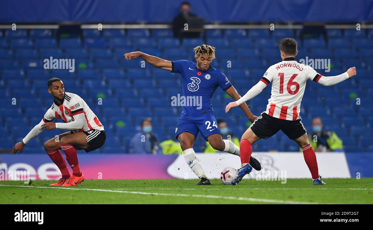 Chelsea's Reece James (centre) has a shot on goal during the Premier ...