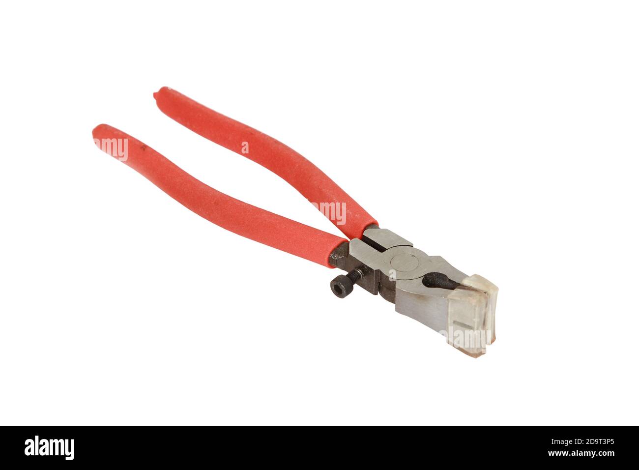 Closeup of a running pliers with red handles isolated on white ...