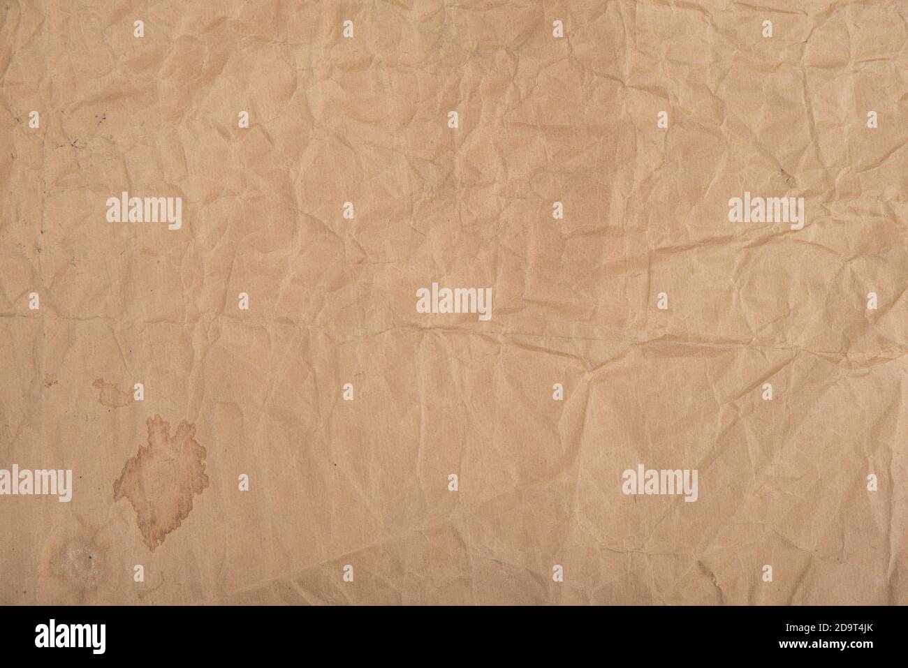 Brown crumpled paper with stains for background Stock Photo - Alamy