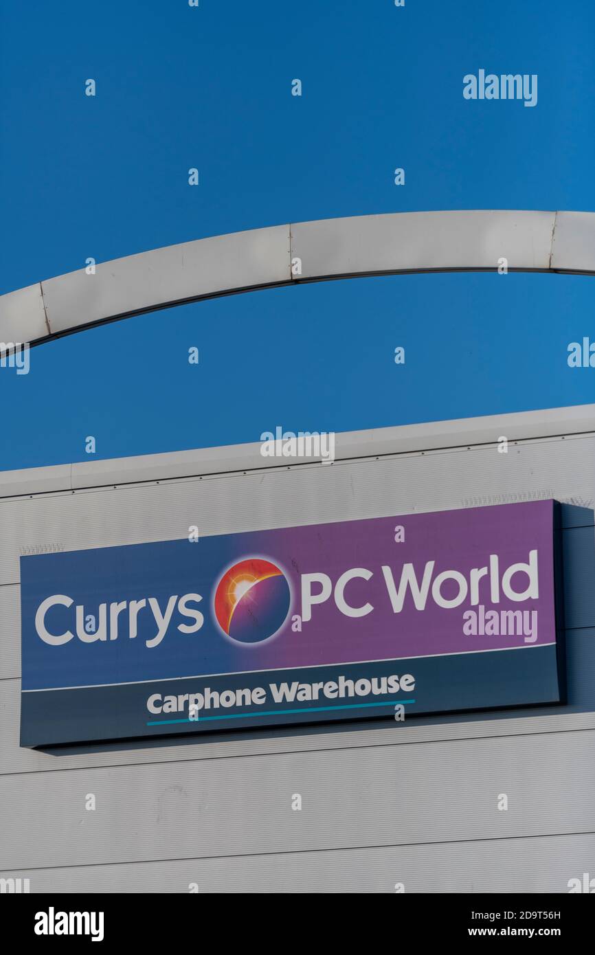 a large sign for currys pc world on an out of town retail park store ...