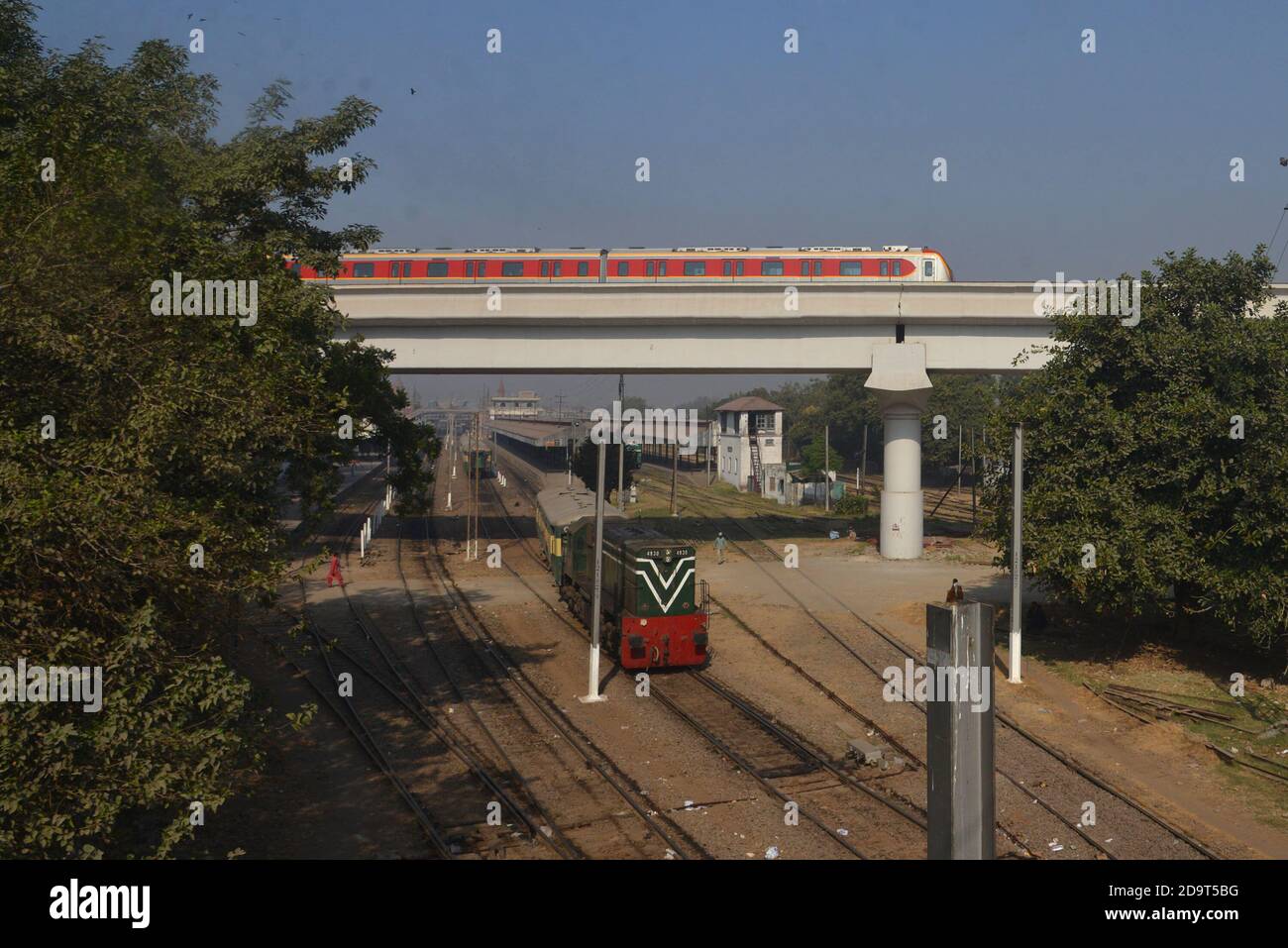Pakistani people enjoying traveling in Orange Line Metro Train (OLMT ...