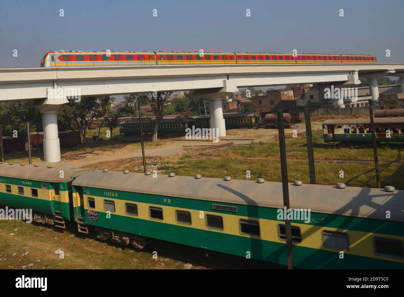 Pakistani people enjoying traveling in Orange Line Metro Train (OLMT ...