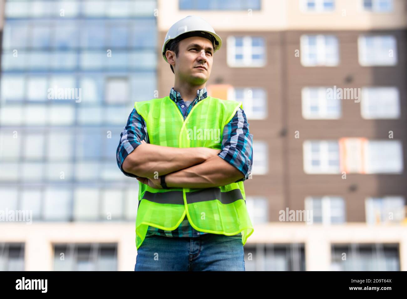 Portrait Of Construction Worker On Building Site Stock Photo - Alamy