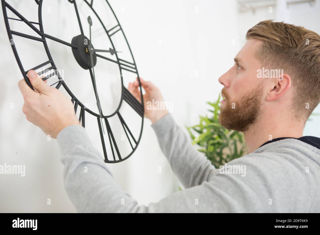 Man clock hammer hi-res stock photography and images - Alamy