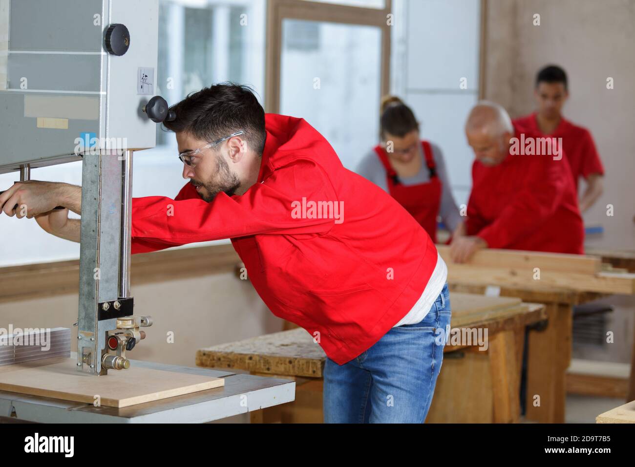 male worker woodworking with milling machine Stock Photo - Alamy