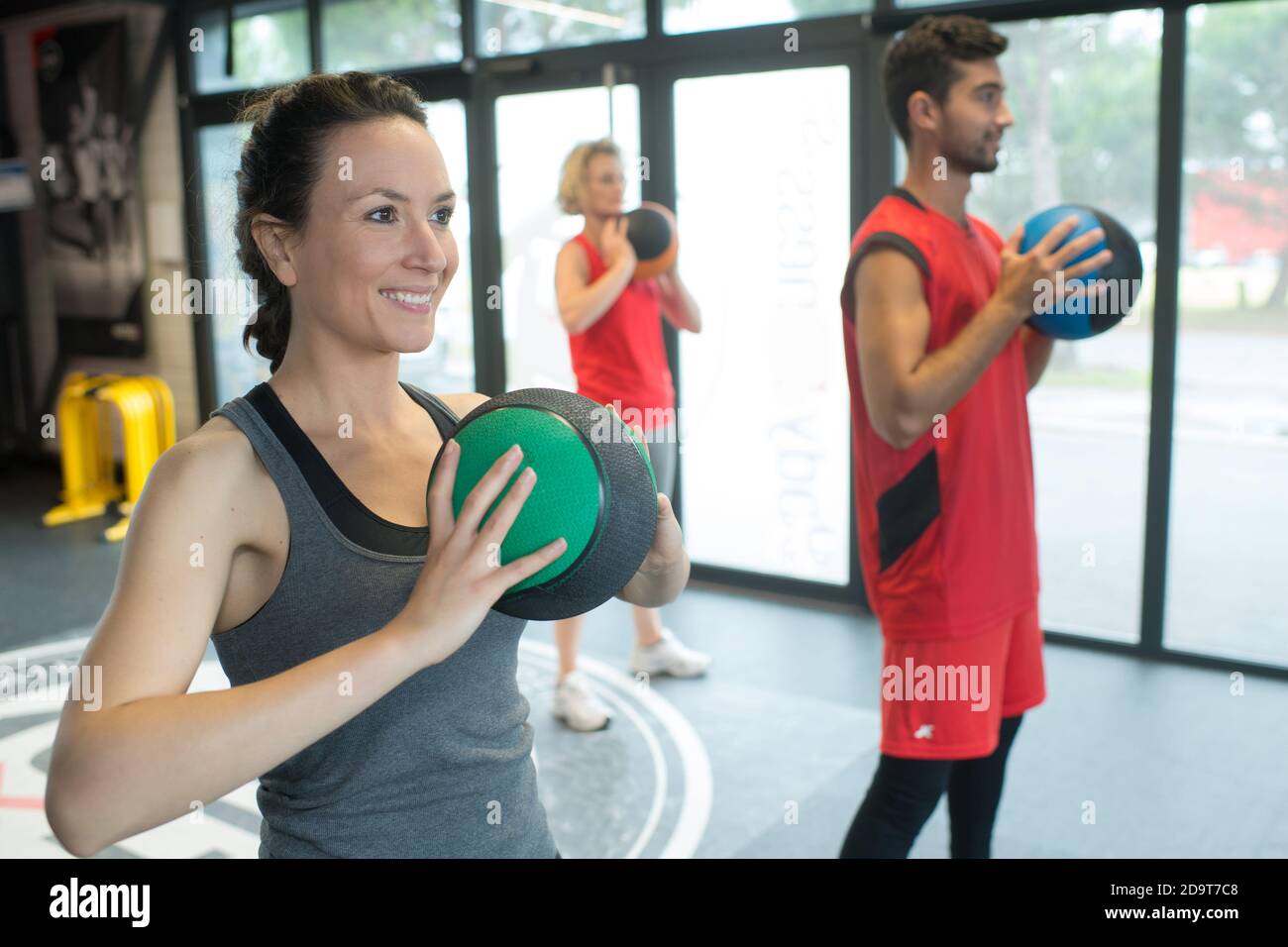 people during cross fit training at gym Stock Photo - Alamy