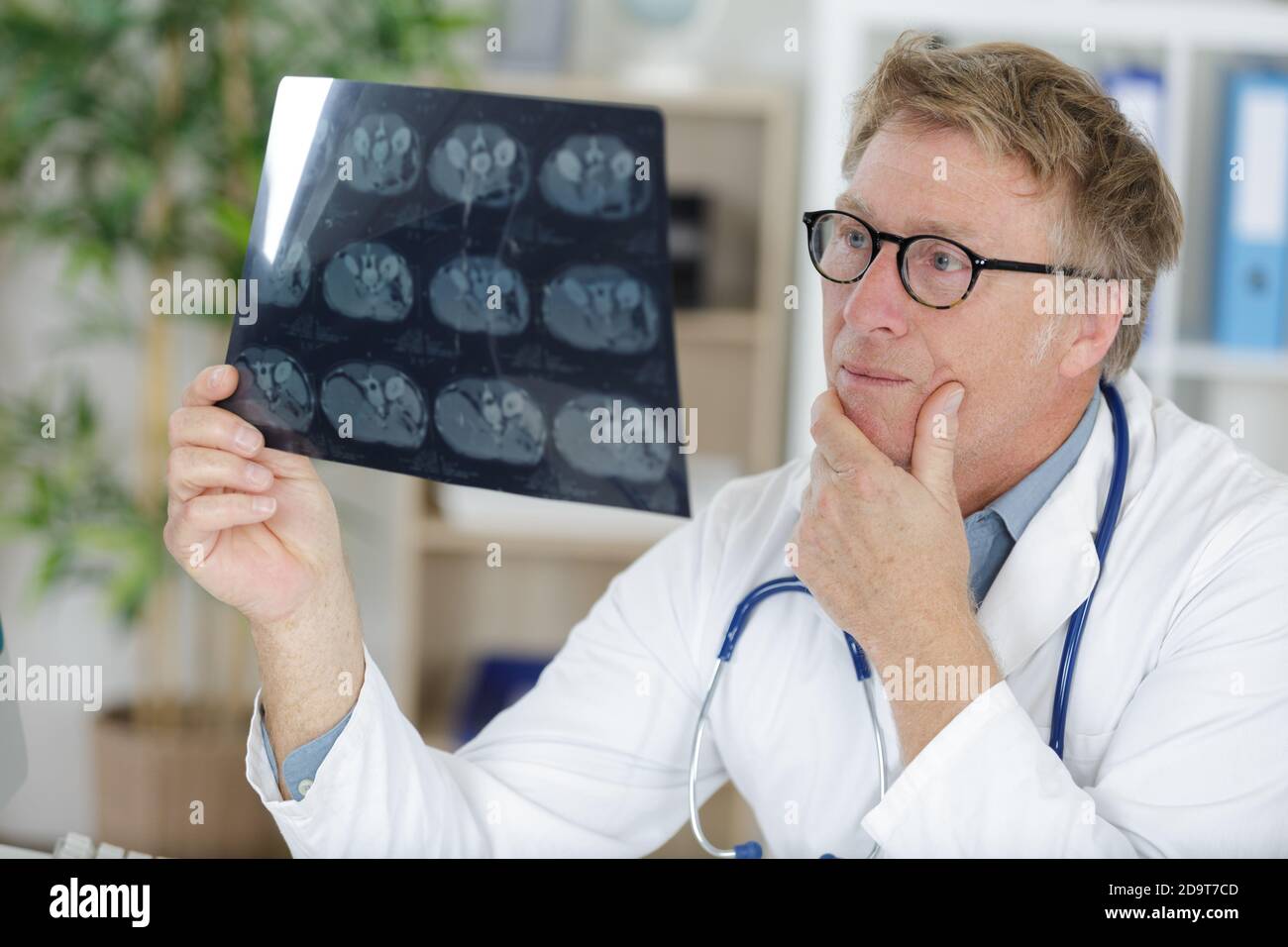 portrait senior doctor over radiography Stock Photo - Alamy