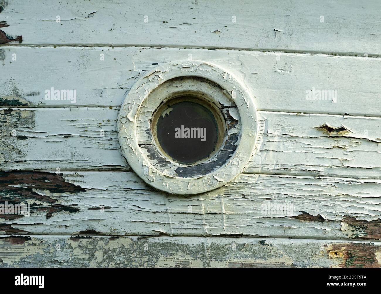 Small porthole in a derelict ship Stock Photo - Alamy