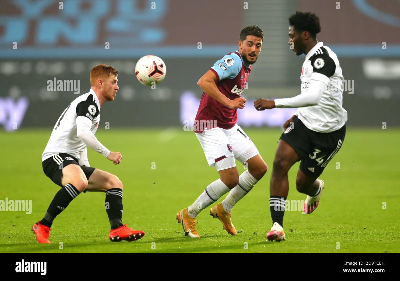 West Ham United's Pablo Fornals (centre) and Fulham's Ola Aina (left ...