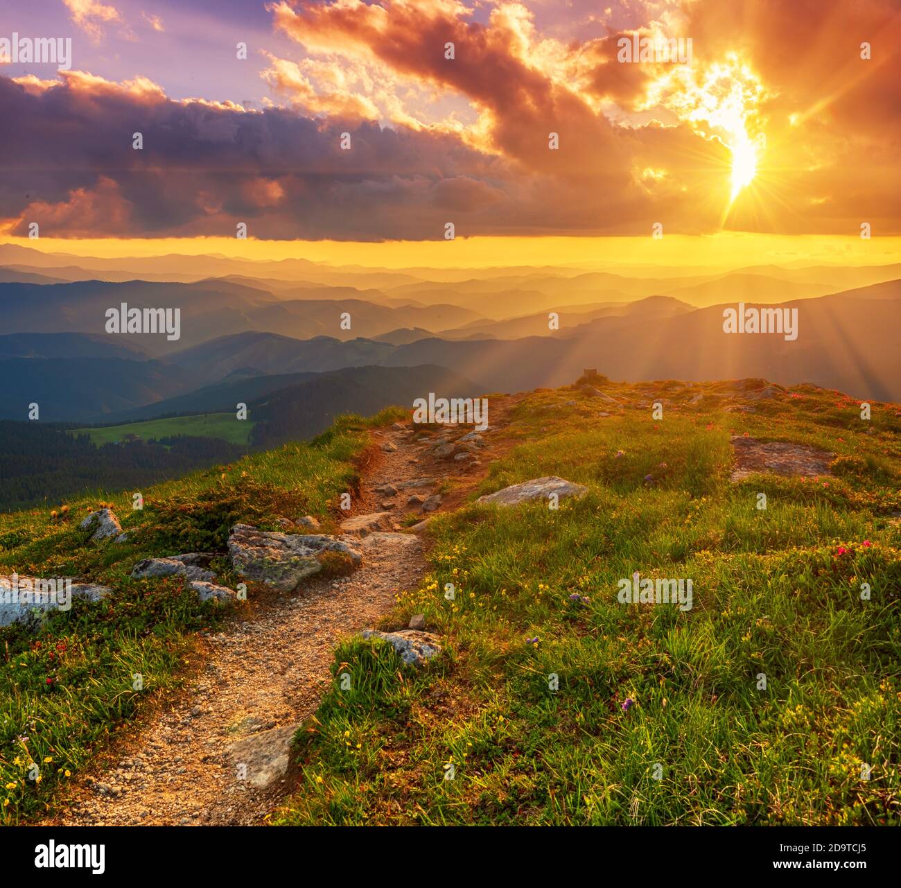 Amazing mountain landscape with colorful vivid sunset on the cloudy sky ...