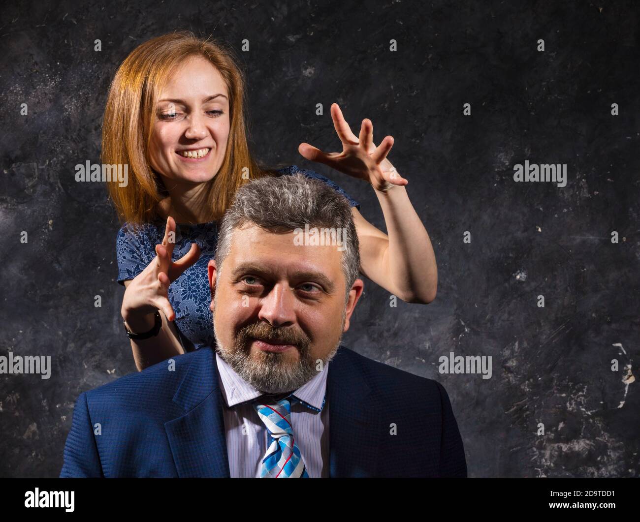 Happy couple have some fun studio portrait Stock Photo - Alamy