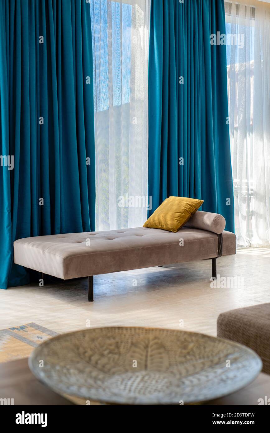 Cozy couch in the interior Stock Photo - Alamy