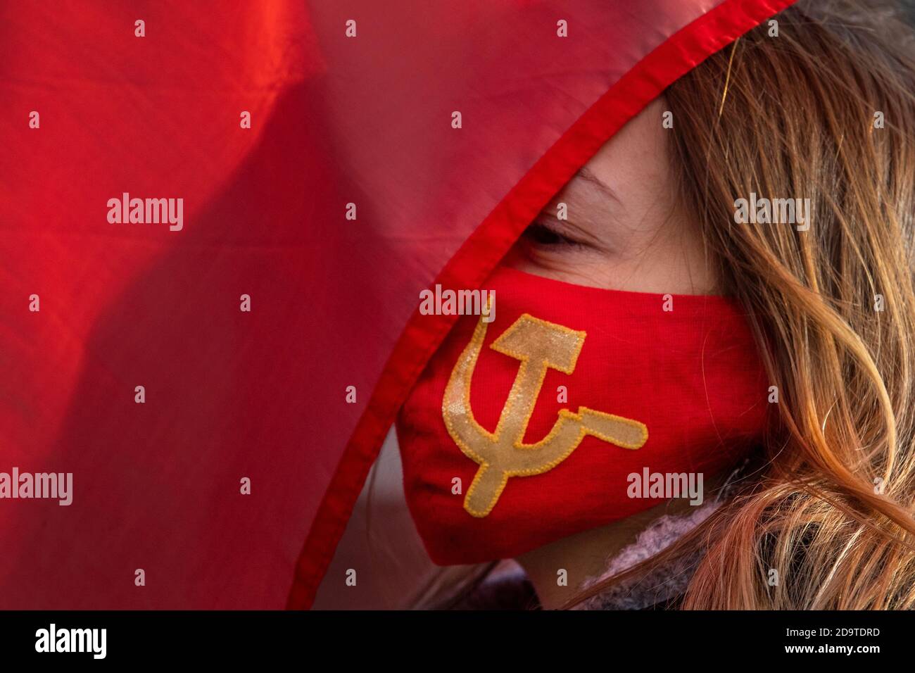 Moscow, Russia. 7th of November, 2020 A woman wearing face mask with a ...