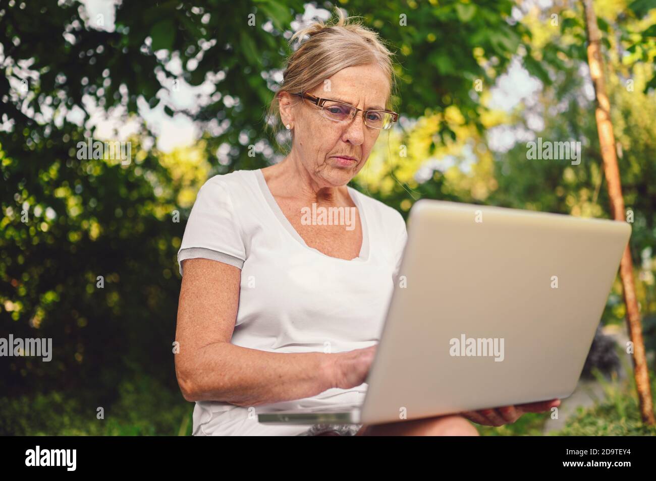 Technology, old age people concept - elderly happy senior old woman ...