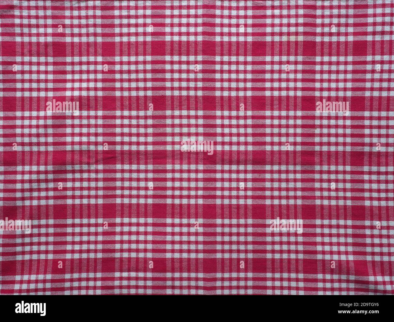 chequered red fabric texture useful as a background Stock Photo - Alamy