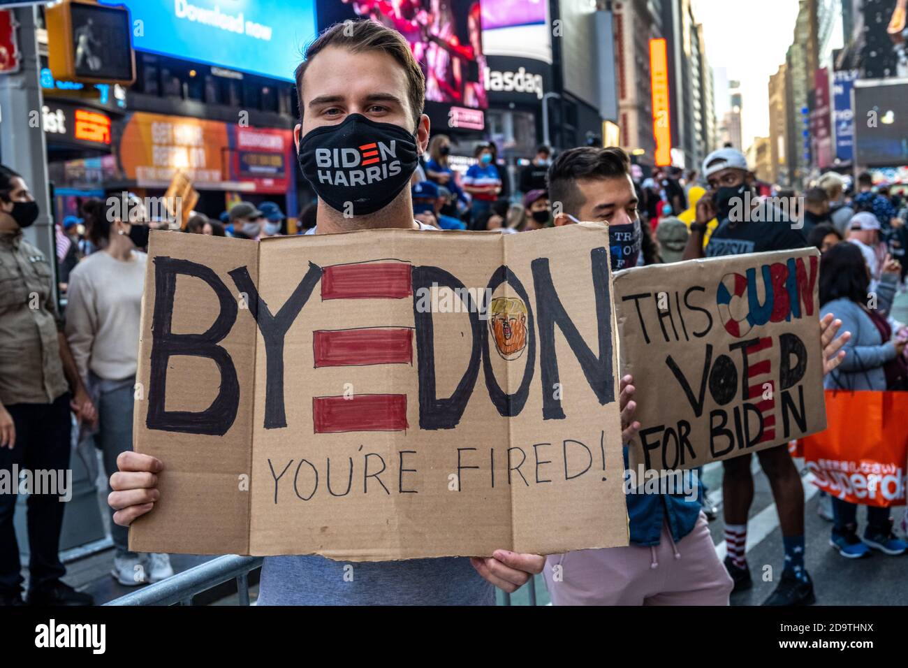 New York, USA. 7th Nov, 2020. People wear face masks as they celebrate ...