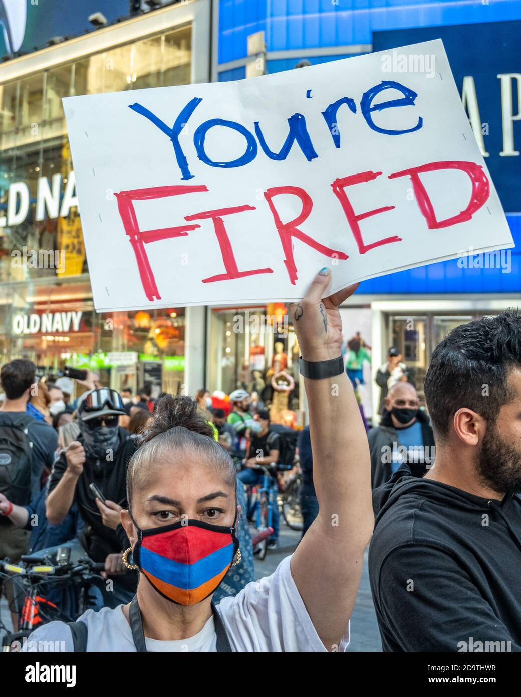 New York, USA. 7th Nov, 2020. People wear face masks as they celebrate ...
