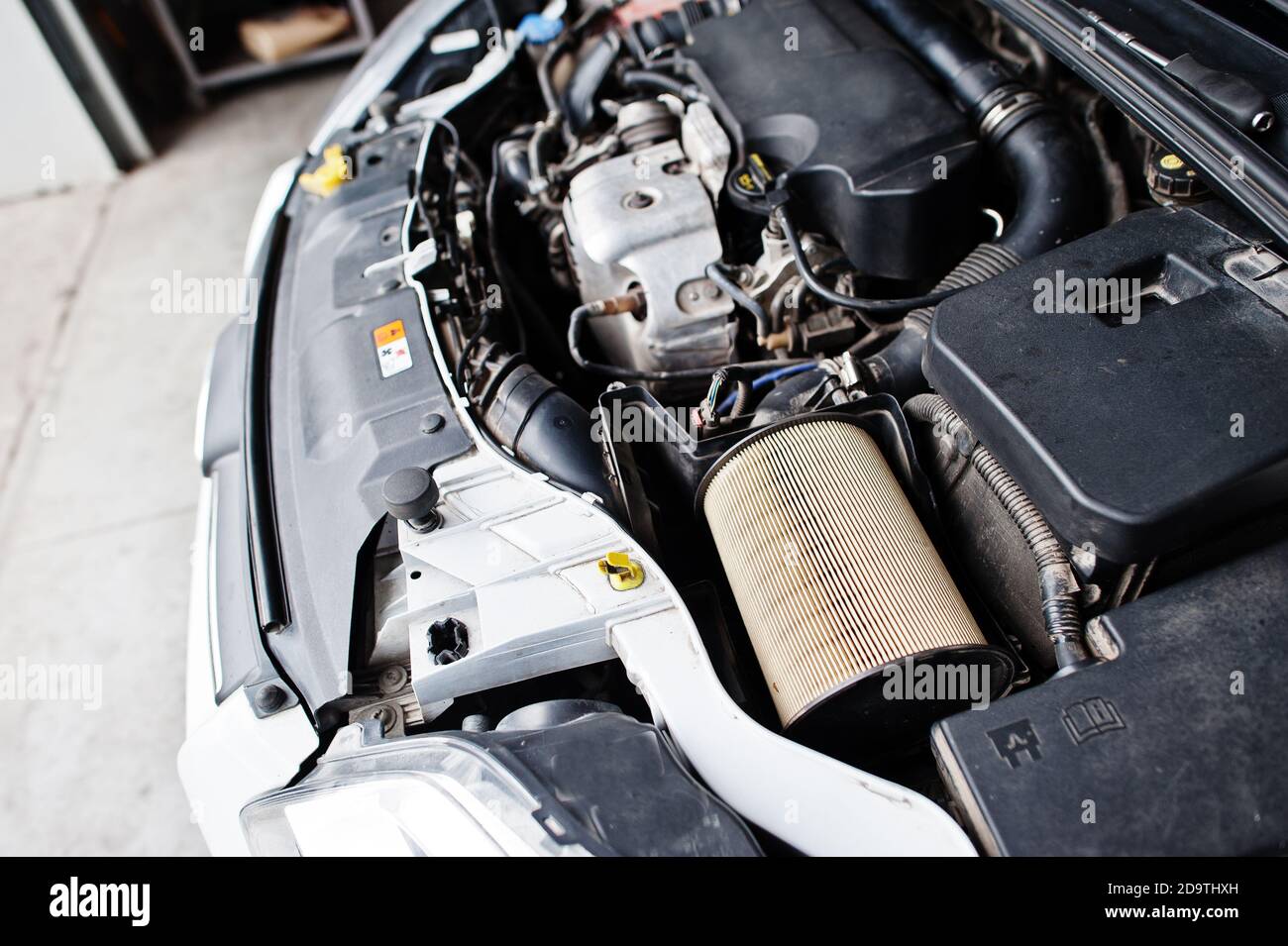 Car repair and maintenance theme. Open hood engine in auto service ...