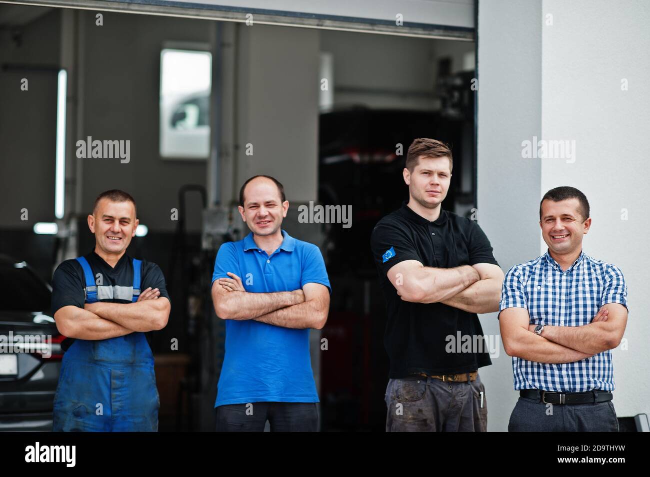 Car repair and maintenance theme. Three mechanic and manager in uniform ...