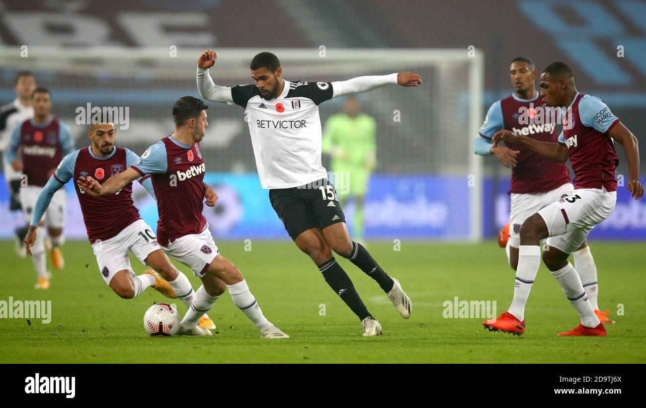 Fulham's Ruben Loftus-Cheek (centre) controls the ball during the ...