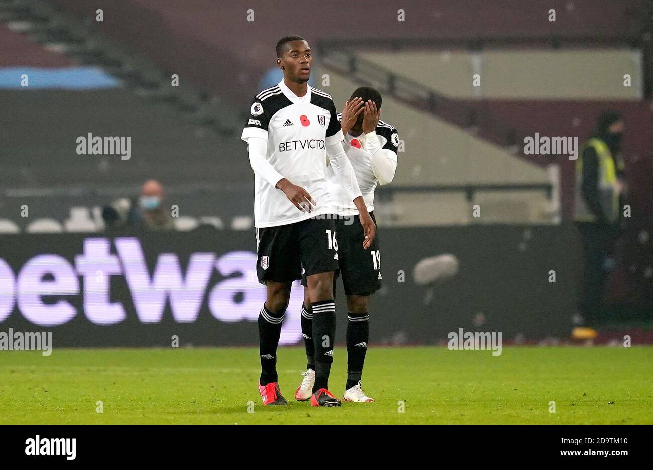 Fulham's Ademola Lookman (right) reacts after the final whistle the ...
