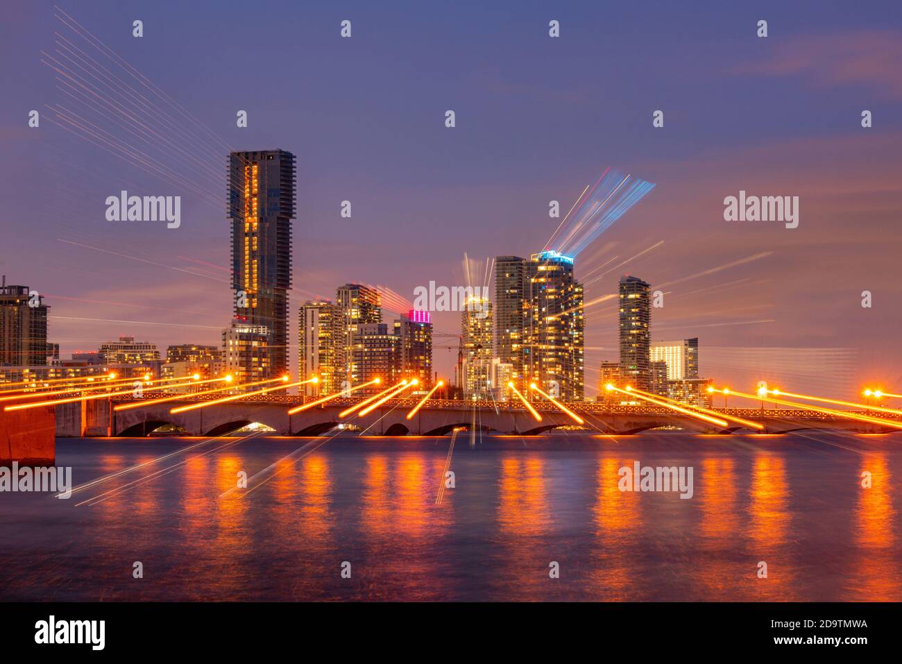 Miami skyline. Miami south beach street view with water reflections at ...