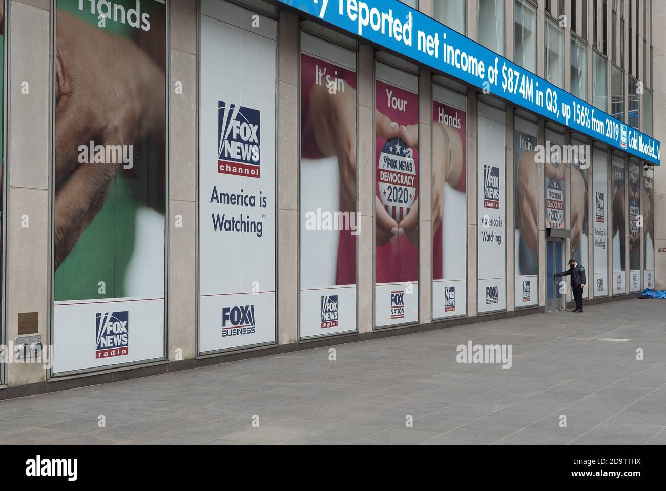 Security man wearing a mask enters FOX News headquarters in midtown ...
