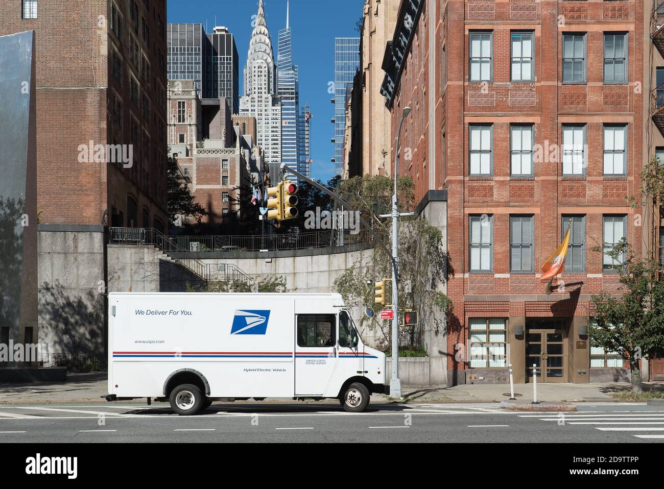 USPS delivery truck with view of Chrysler Building, parked on first ...