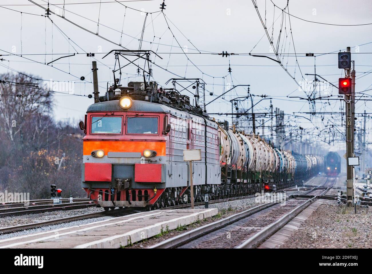 Freight train moves on the station. Russia Stock Photo - Alamy