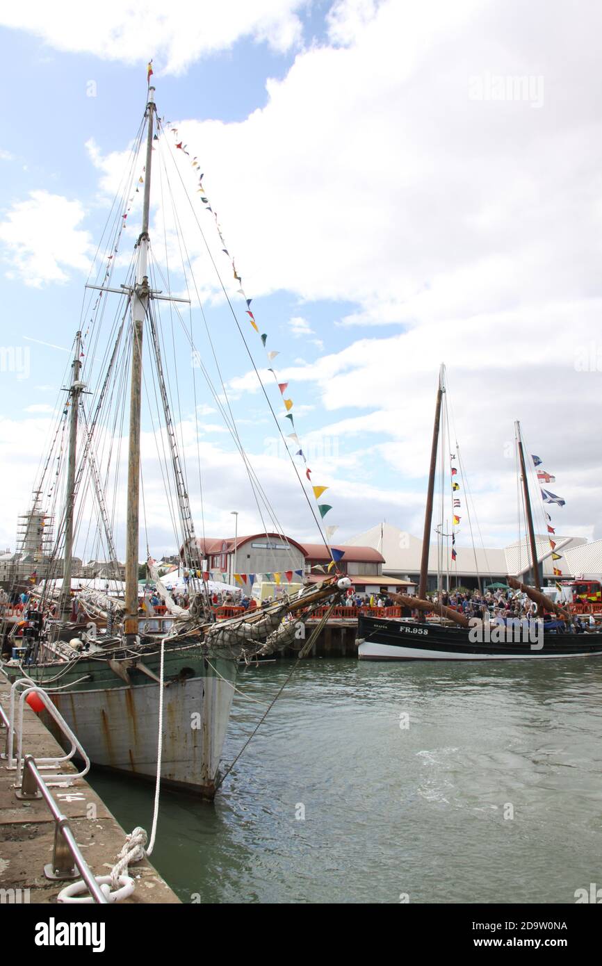 Two old traditional Scottish sailing fishing boats alongside at ...
