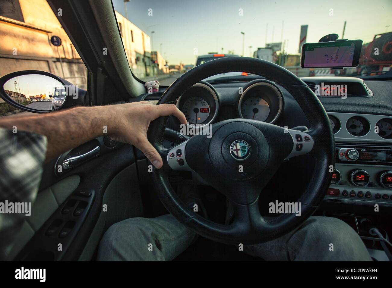 First-person view of a driver driving his car during a trip Stock Photo ...