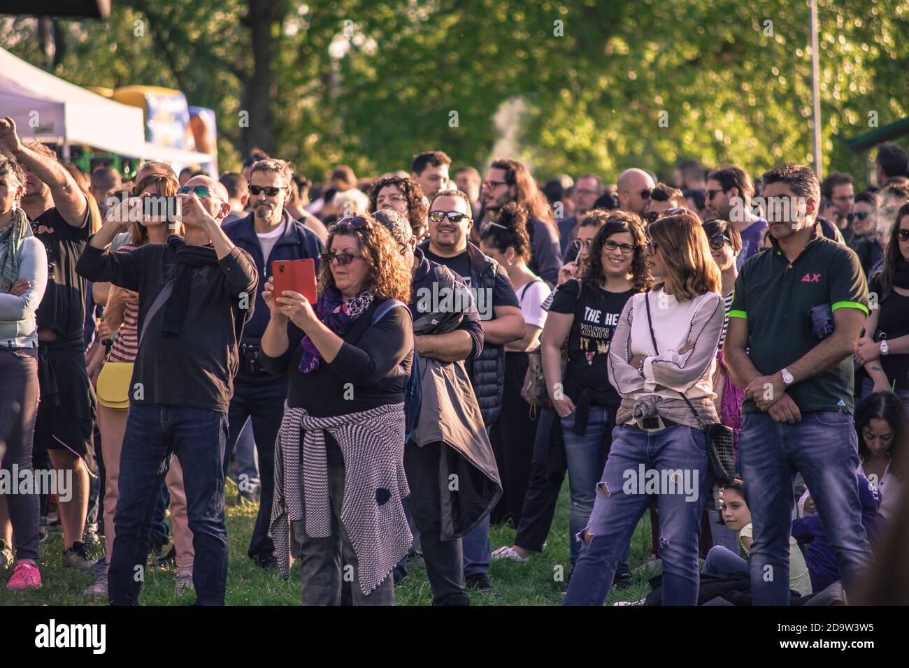Concert crowd arms sunset hi-res stock photography and images - Alamy