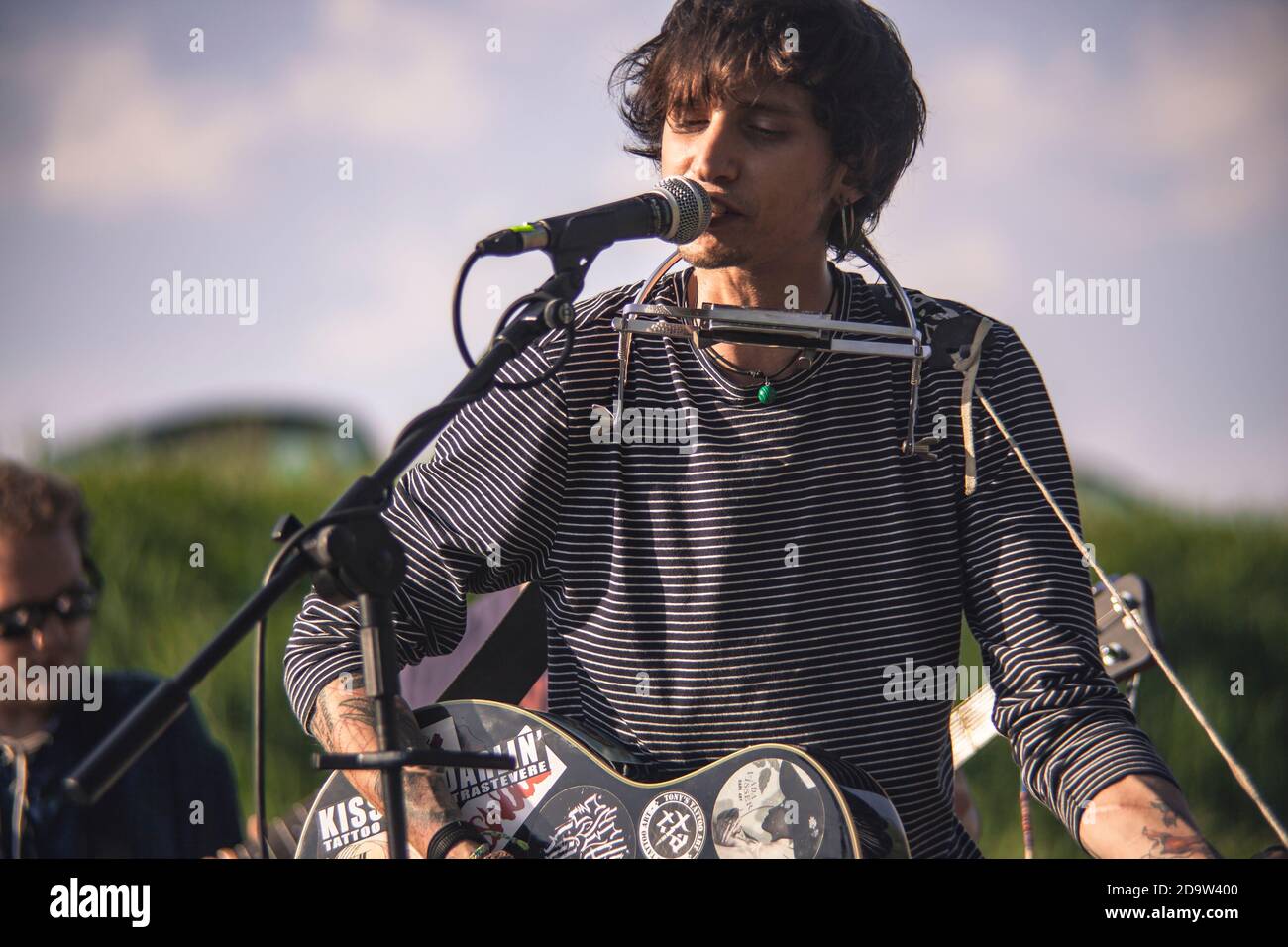 Playing guitar during the sunset hi-res stock photography and images ...